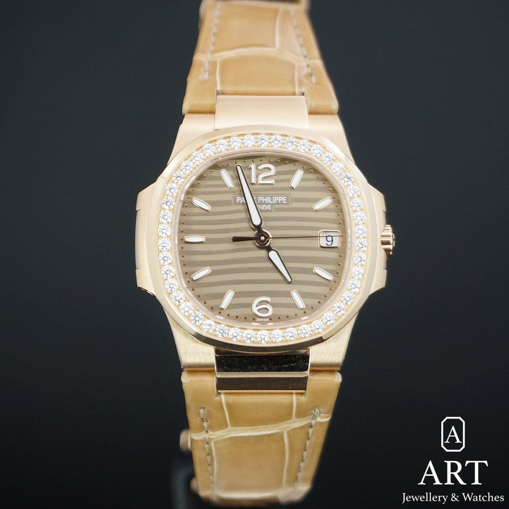 Patek Philippe Nautilus 32,5mm 7010R-012 – ART Jewellery & Watches